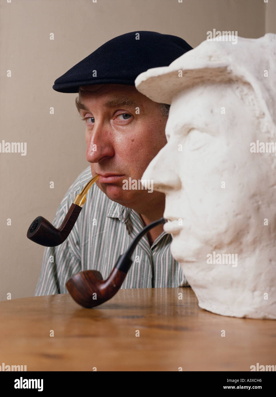 Actor Christopher Benjamin with sculpture of himself. Picture taken in ...