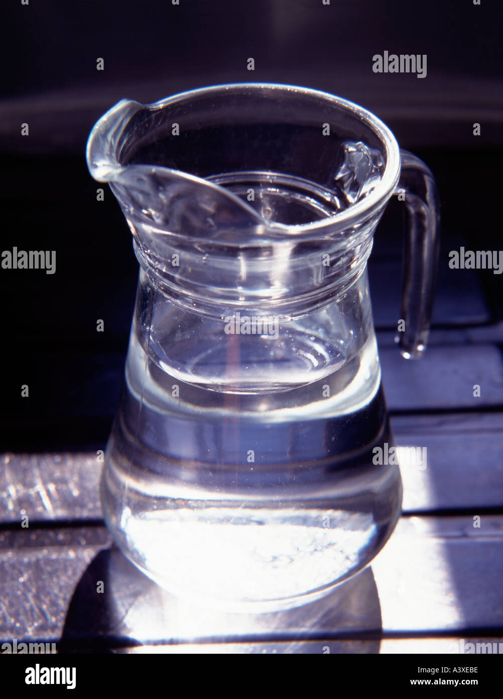 Glass jug of drinking water Stock Photo - Alamy