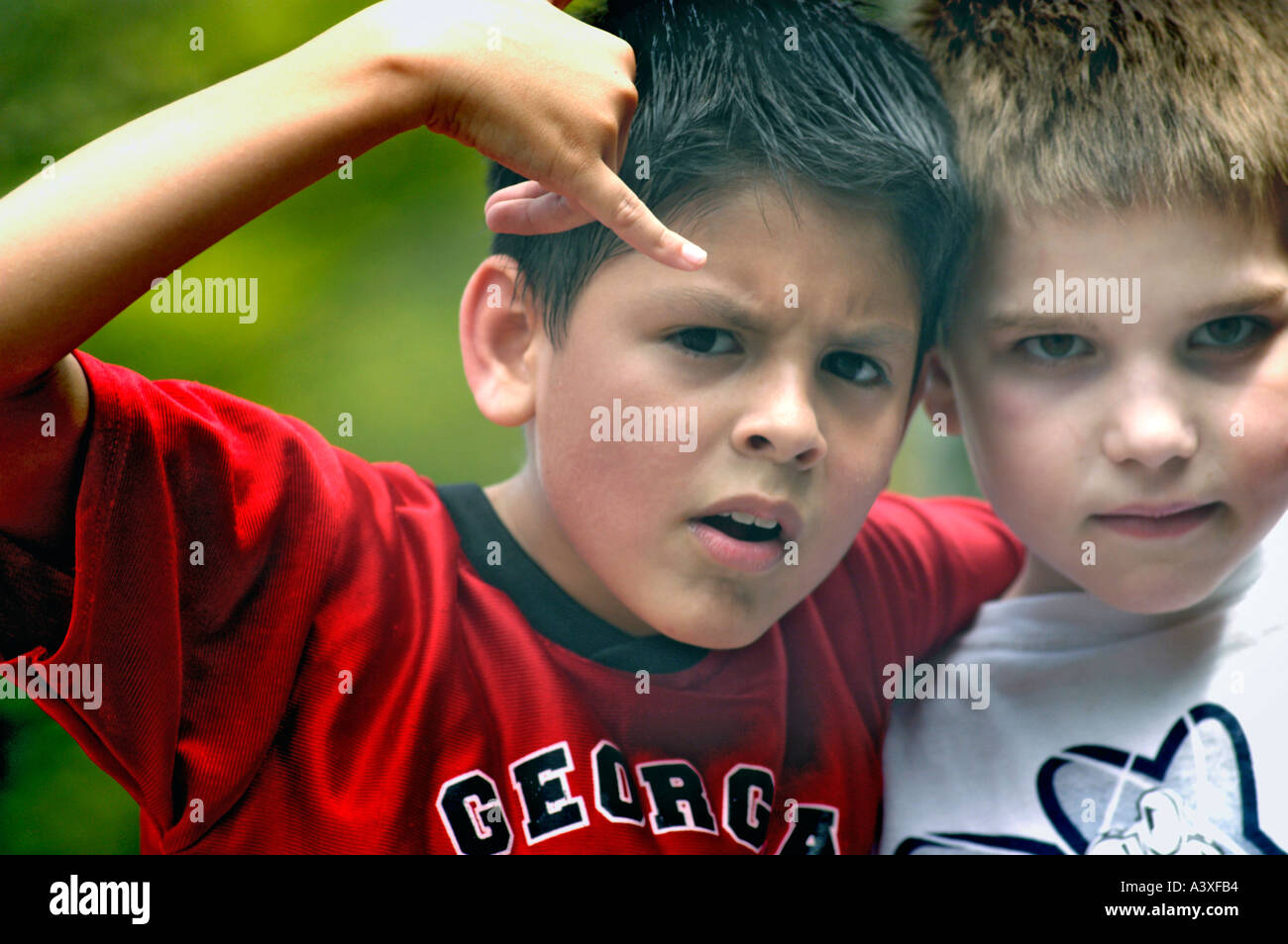 Two Friends with Attitude and hand sign looking like one is aggressive ...