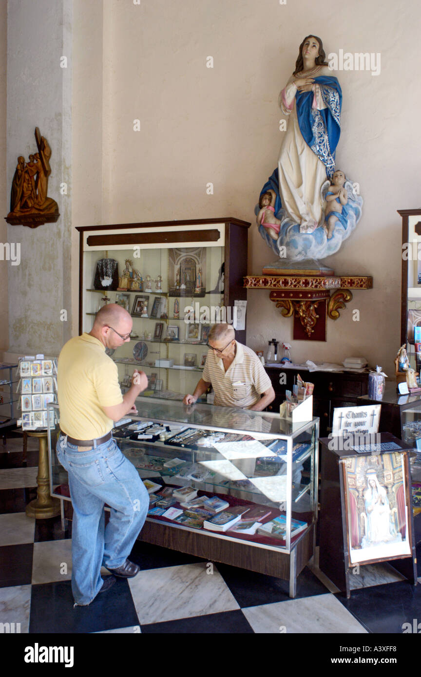 Man shopping for religious items in gift shop of Catholic Church in Old ...