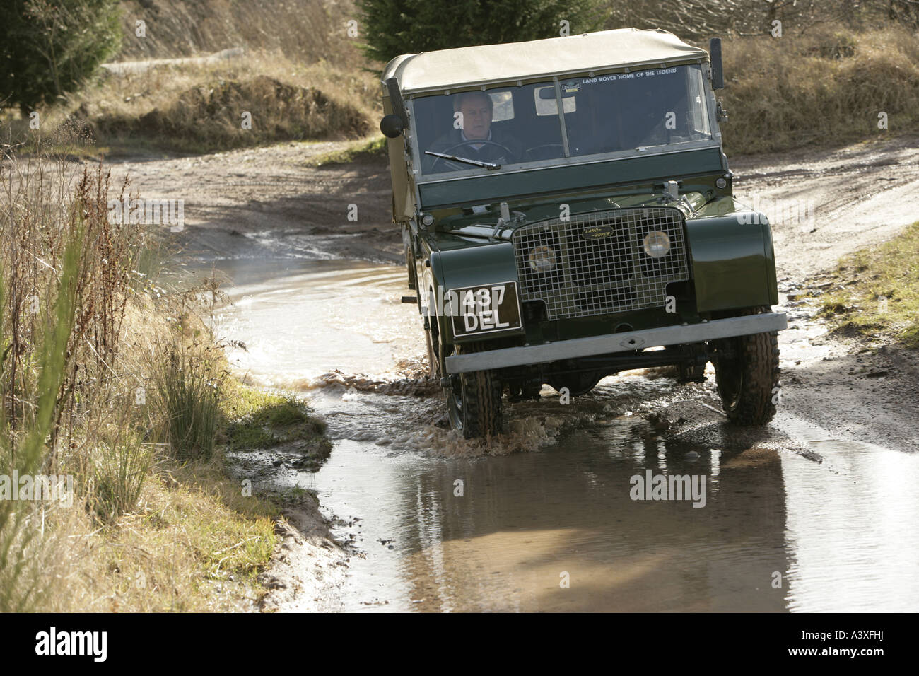 Series One Land Rover on an off-road course at the Land Rover factory ...