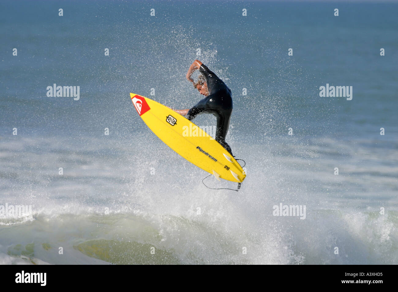 Surfer performs an Aerial Stock Photo - Alamy