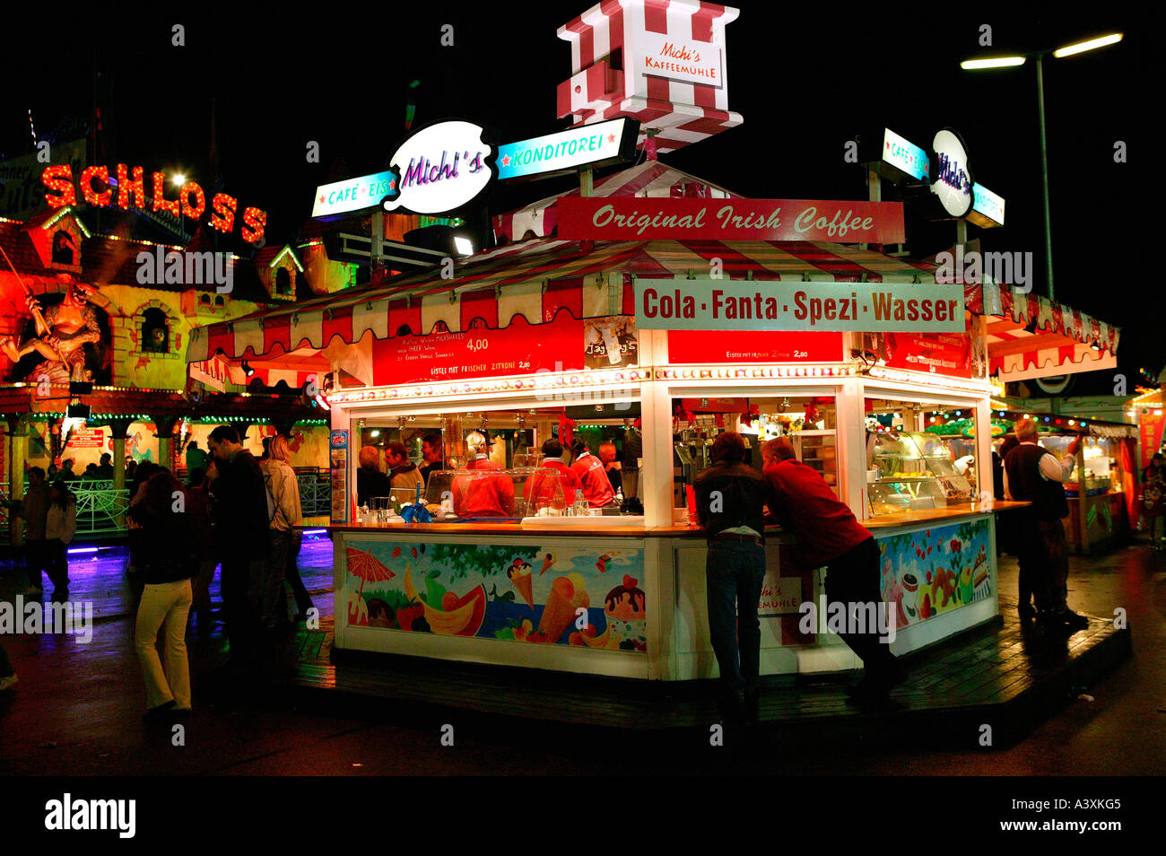 Oktoberfest in Munich at night Stock Photo - Alamy
