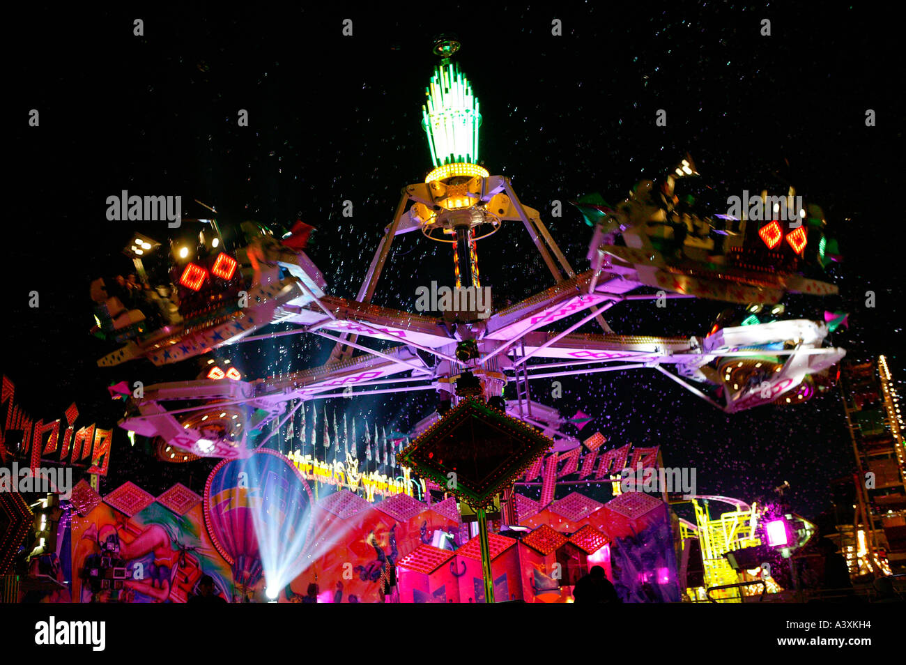 Oktoberfest in Munich at night Stock Photo - Alamy