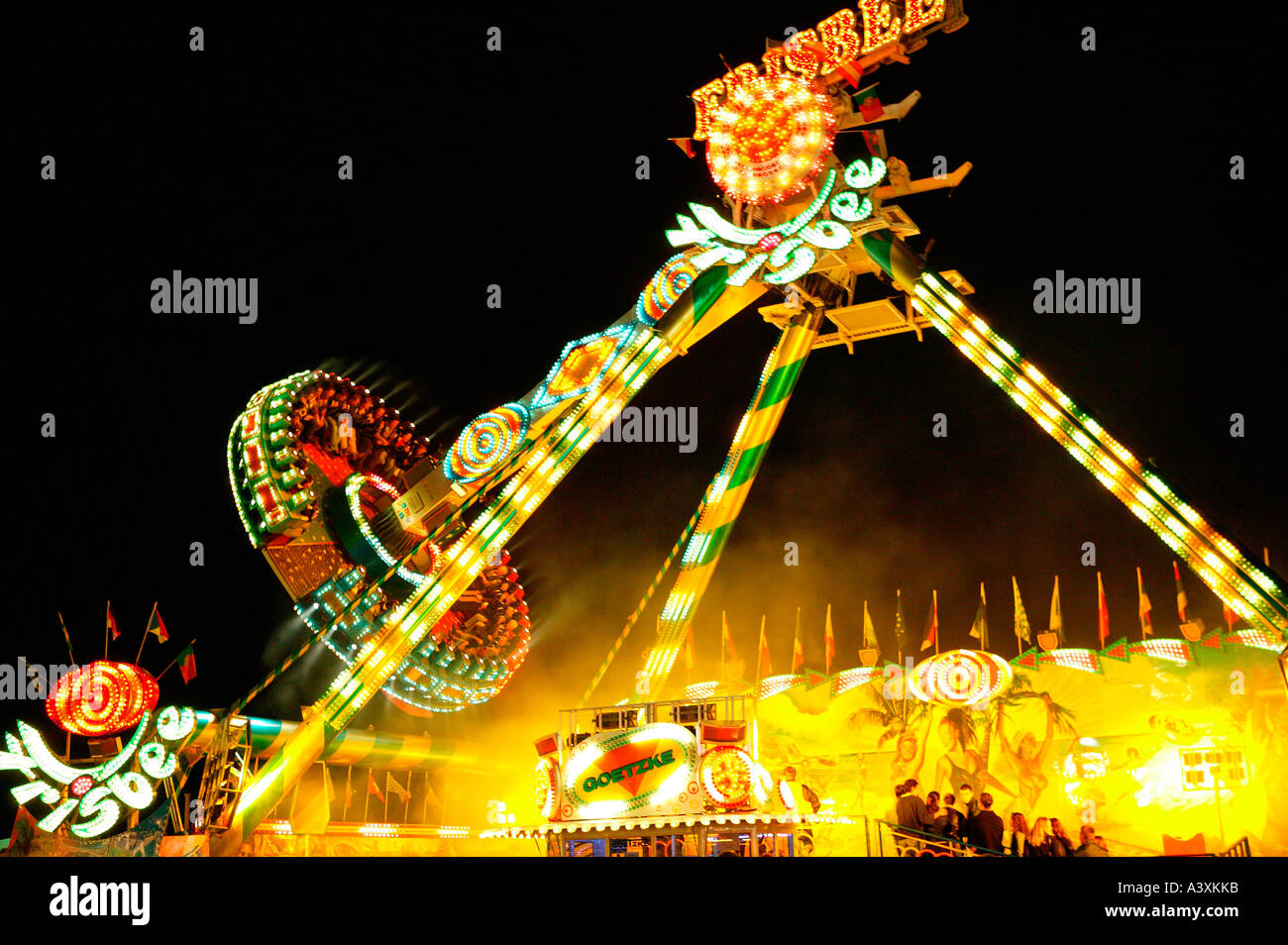 Oktoberfest in Munich at night Stock Photo - Alamy