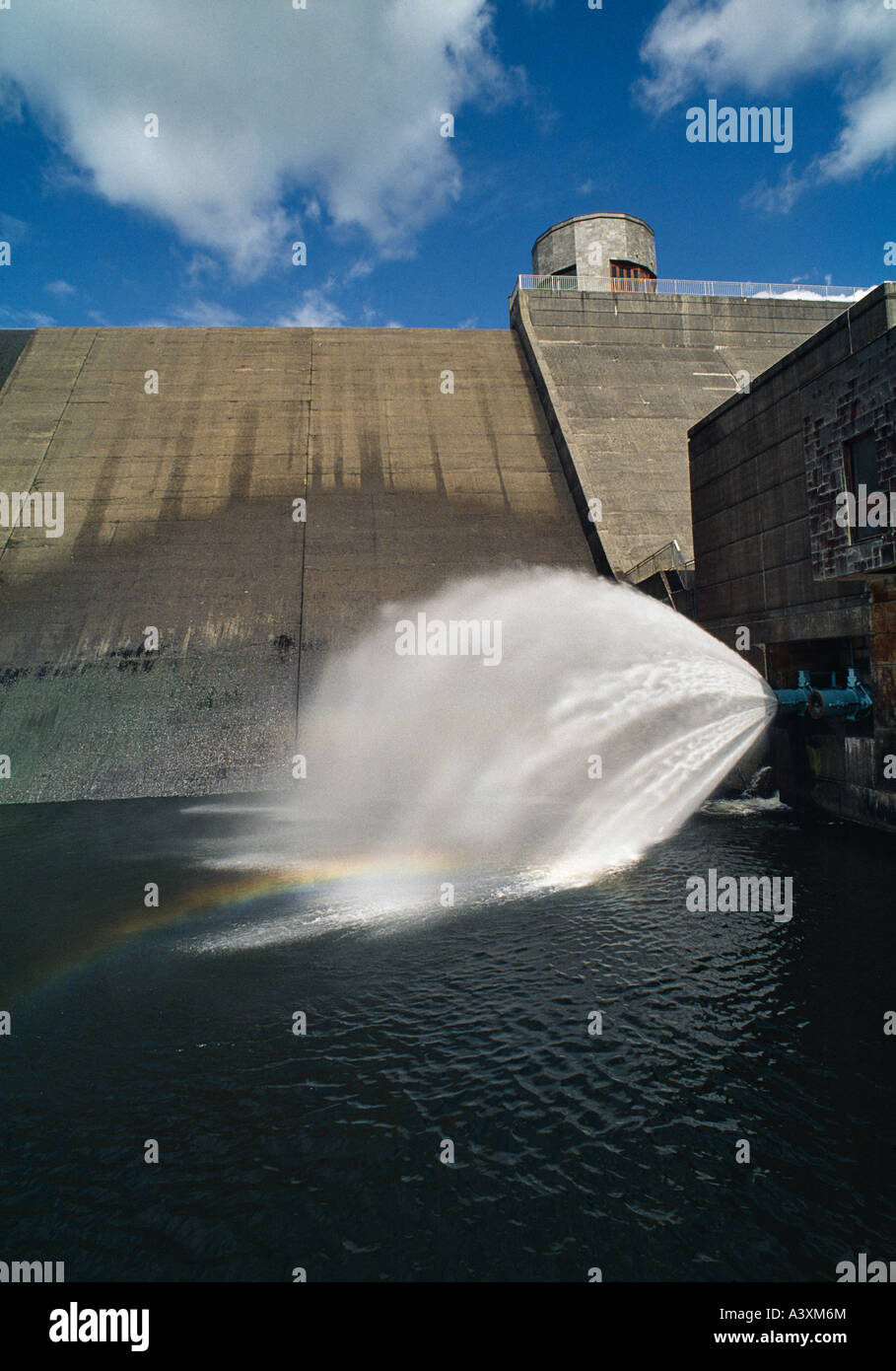 OVERFLOW WATER BEING LET OUT OF BASE OF DAM IN MID- WALES UK Stock ...