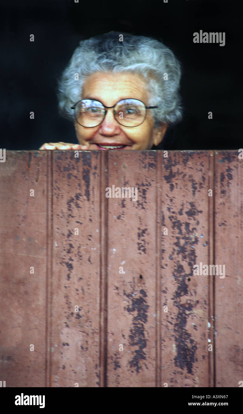 Old lady peeking hi-res stock photography and images - Alamy
