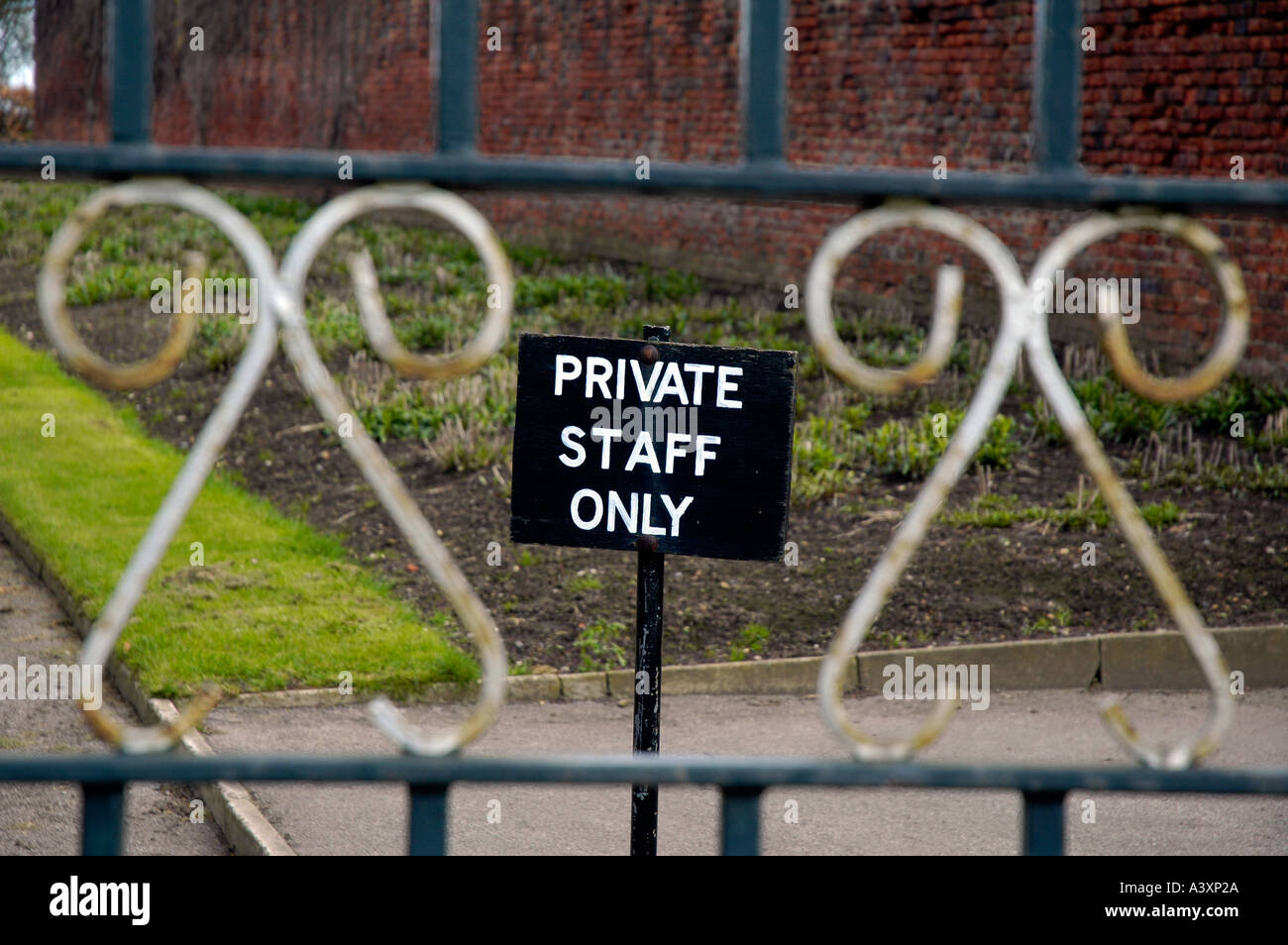 Satff only sign restricting public access to a garden area in West ...
