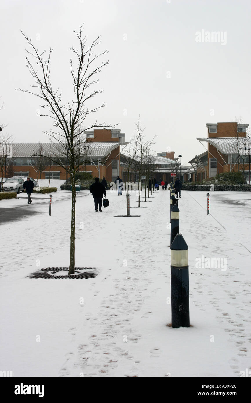Office Workers trudge through the snow Stock Photo - Alamy