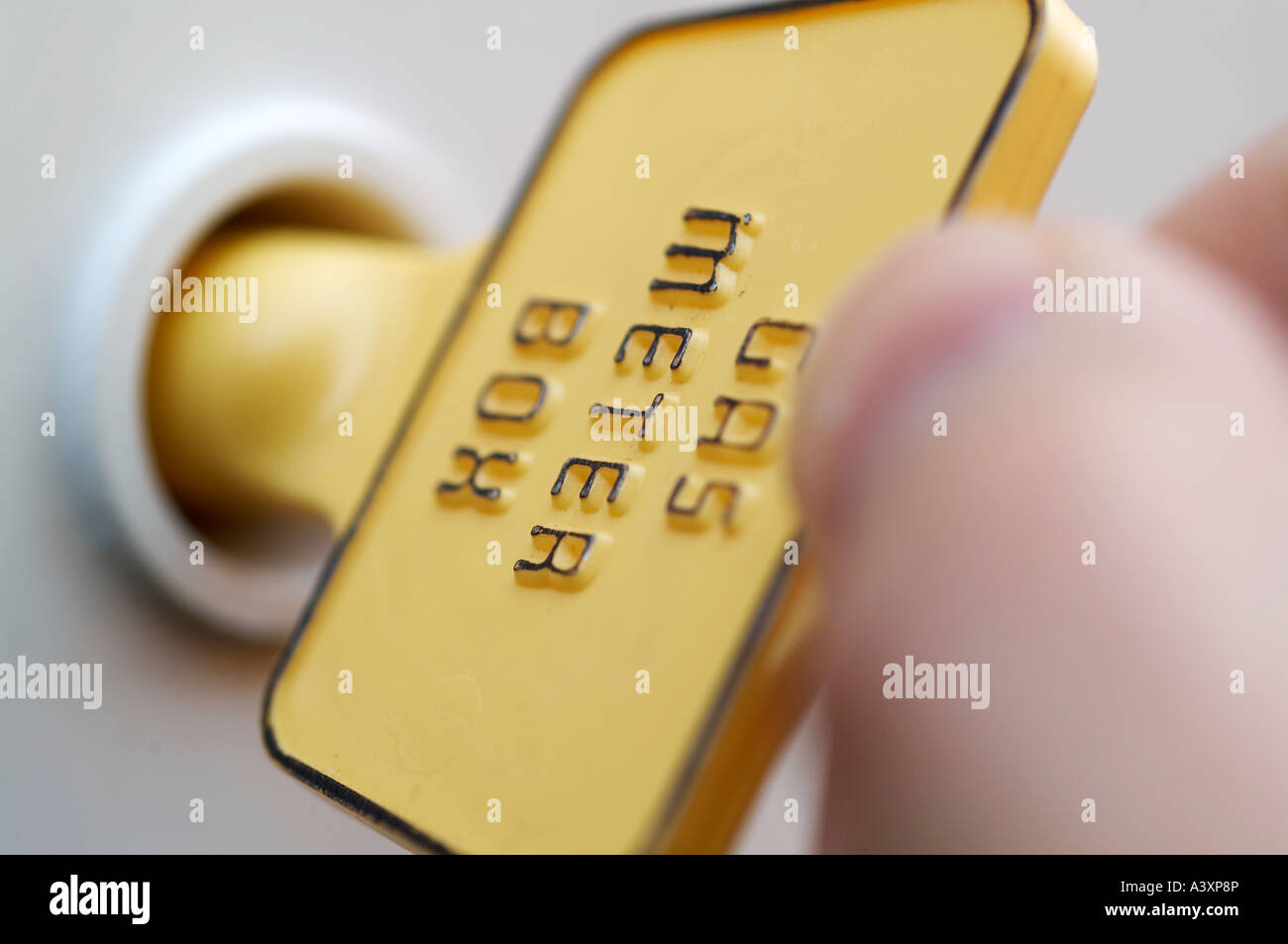 Yellow gas meter key to meter box Stock Photo - Alamy