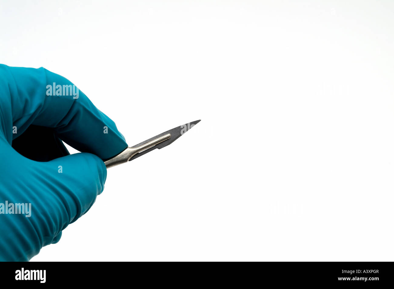 scalpel blade gloved hand,Surgery Stock Photo - Alamy
