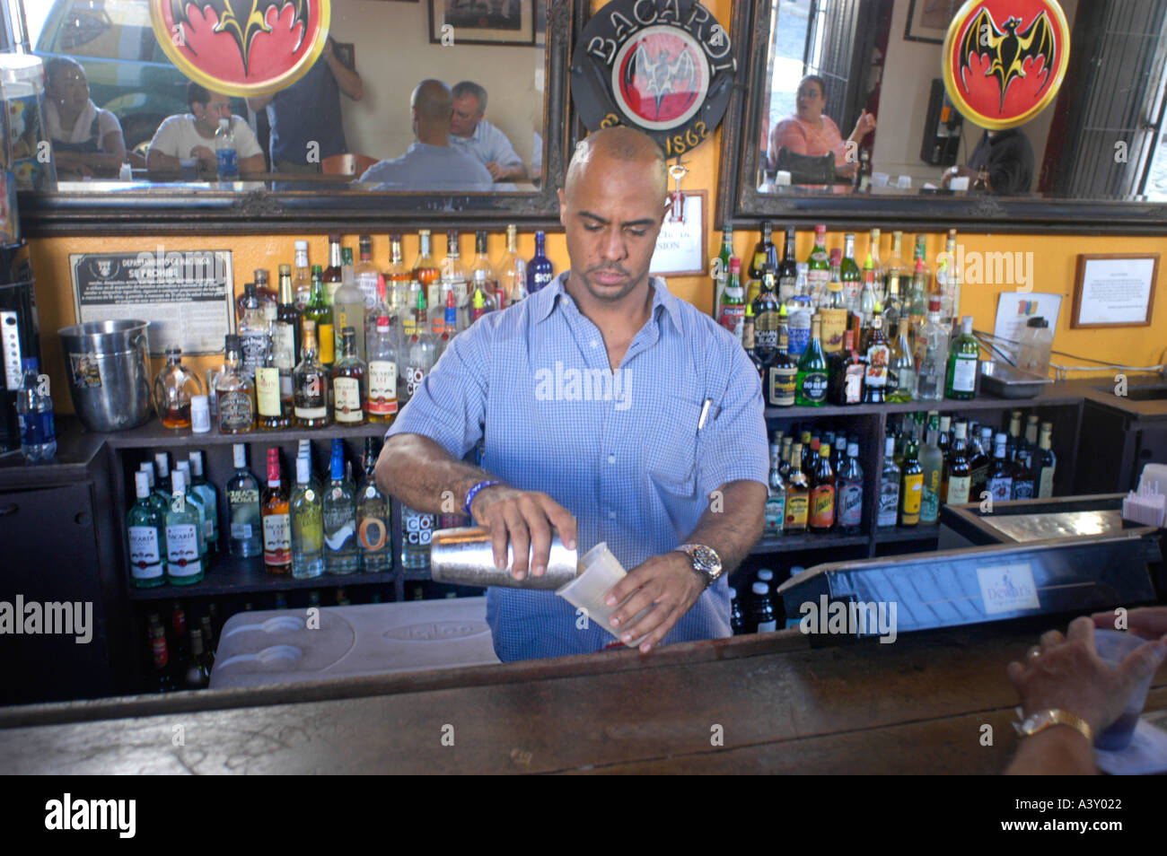 Bartender in Old San Juan Puerto Rico with buzz cut Stock Photo - Alamy
