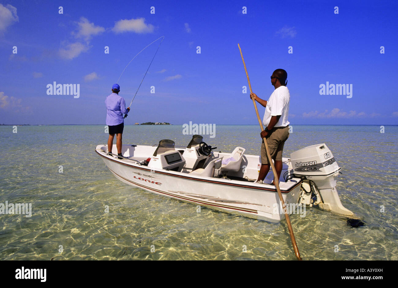 tourist fishing with boat, Belize Stock Photo - Alamy