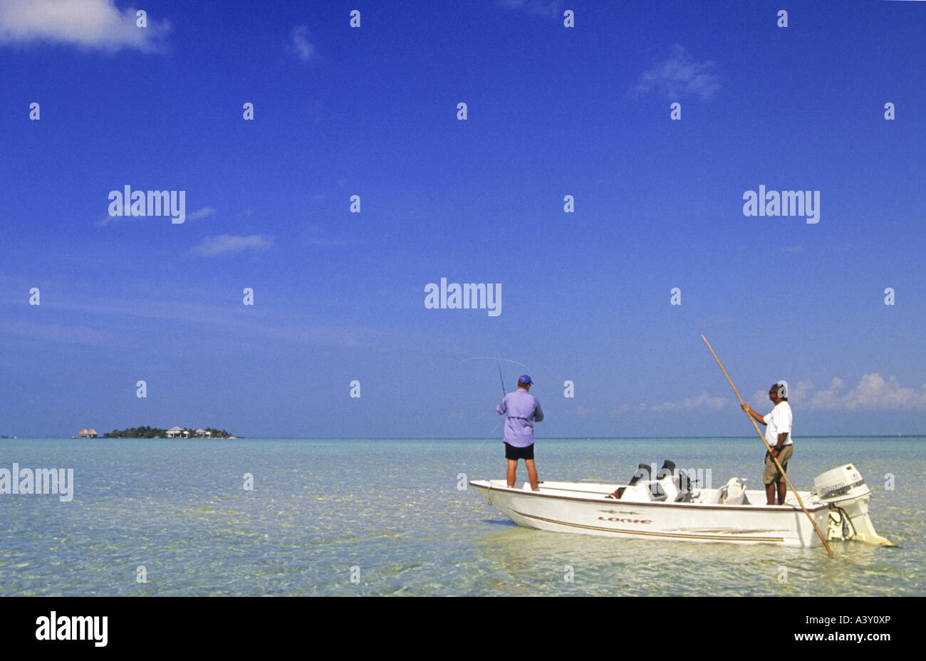 tourist fishing with boat, Belize Stock Photo - Alamy