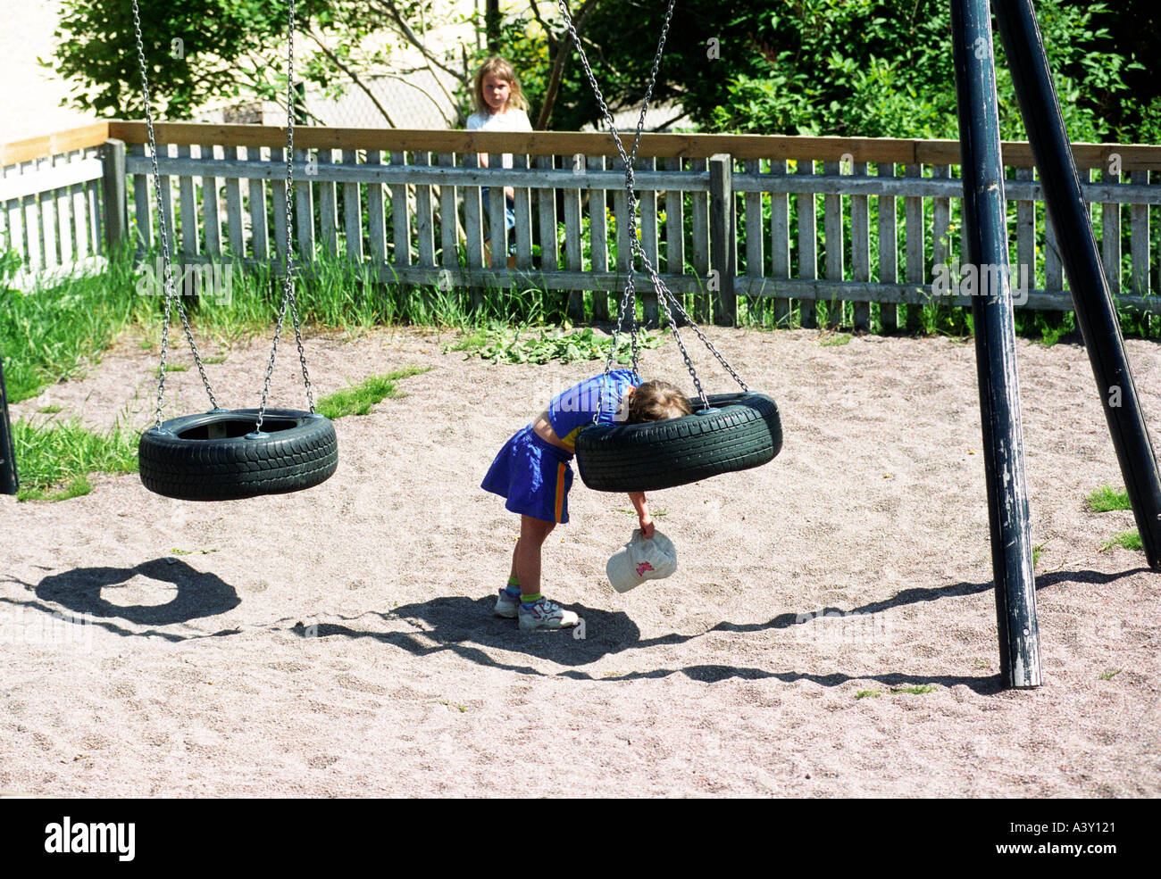 Alone child playground lonely sad hi-res stock photography and images ...