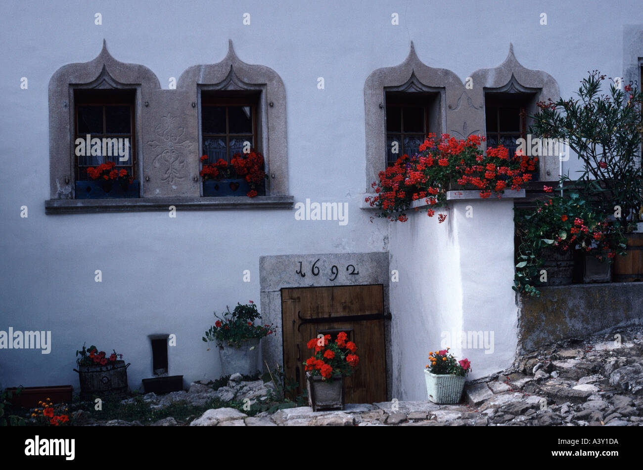 Medieval doorway and windows at Gruyere town, canton of Fribourg, in ...