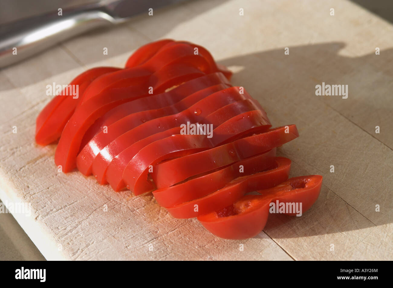 close up of cut red pepper in kitchen Stock Photo - Alamy