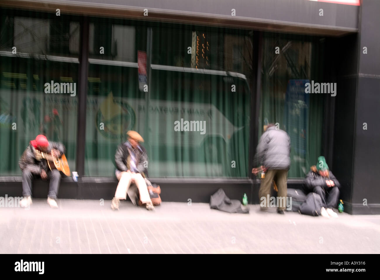 Street life New York City four men sidewalk building window Stock Photo ...