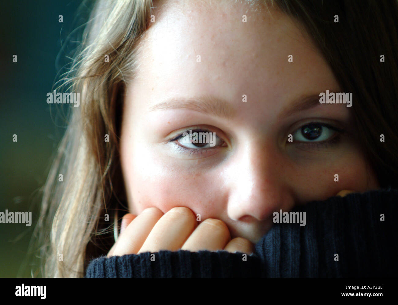 face shy timid Stock Photo - Alamy