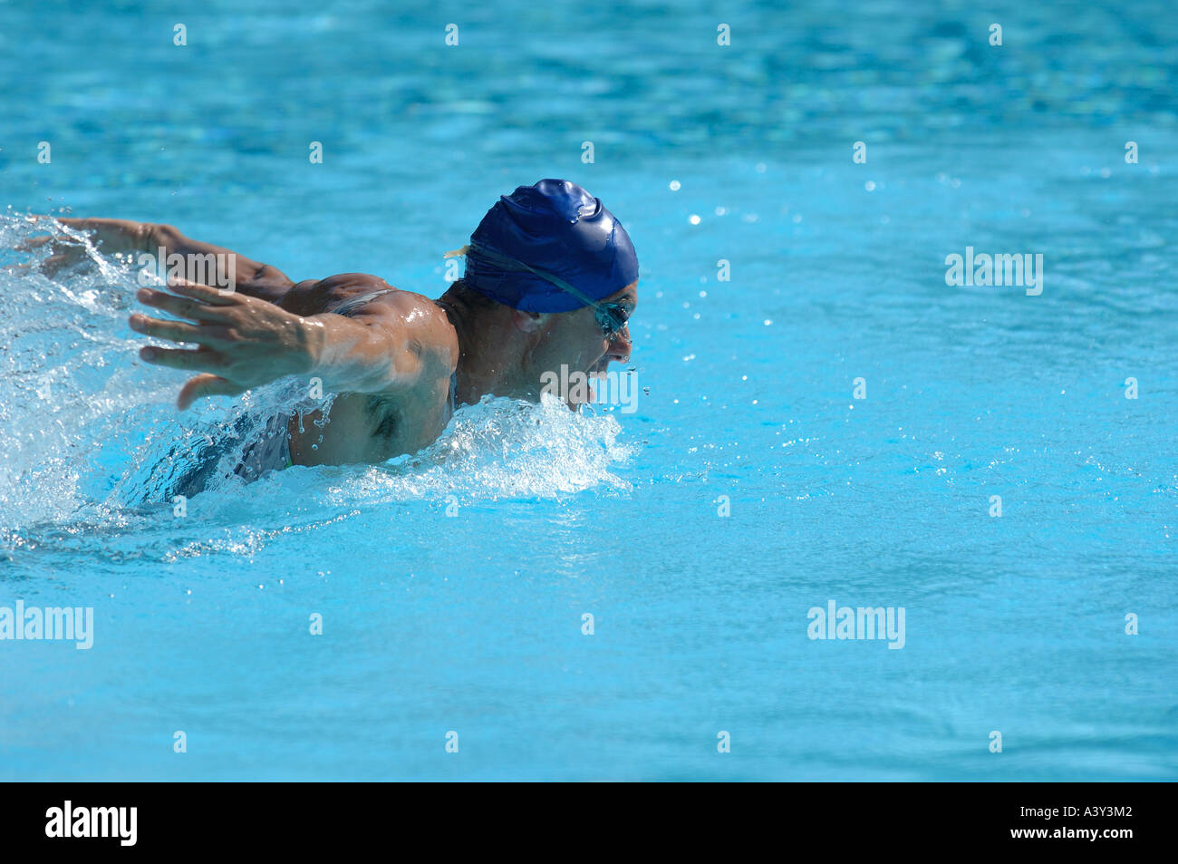 Male Swimmer Swimming Butterfly Stock Photo - Alamy
