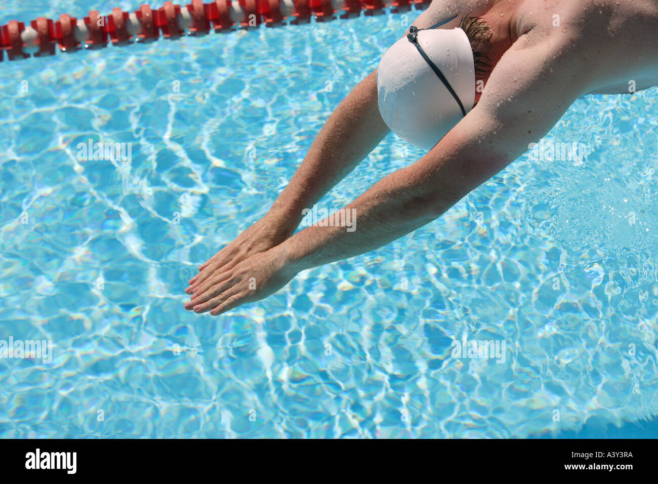 Male Swimmer Diving Stock Photo - Alamy