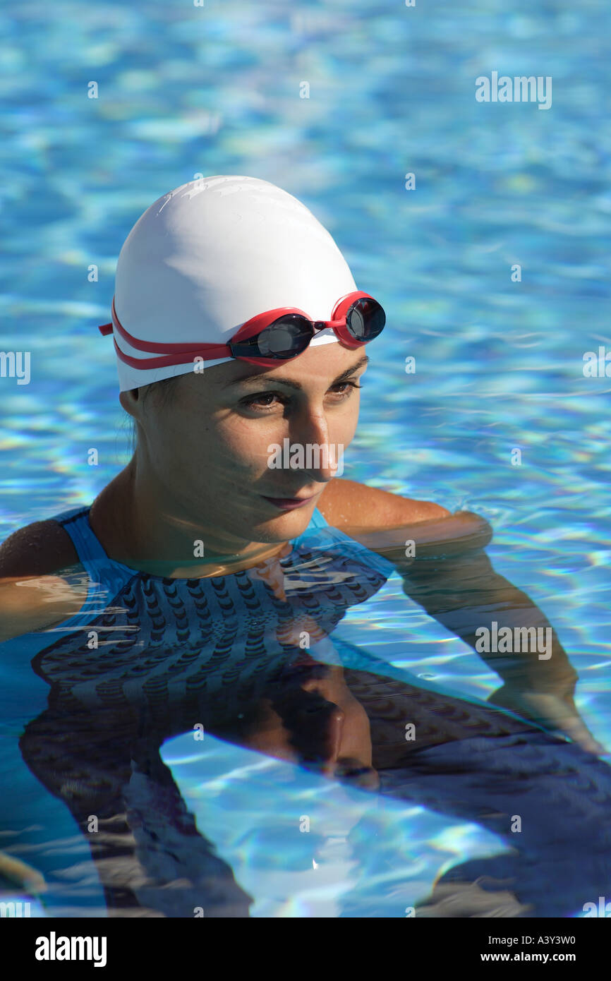 Female Swimmer Floating in Pool Stock Photo - Alamy