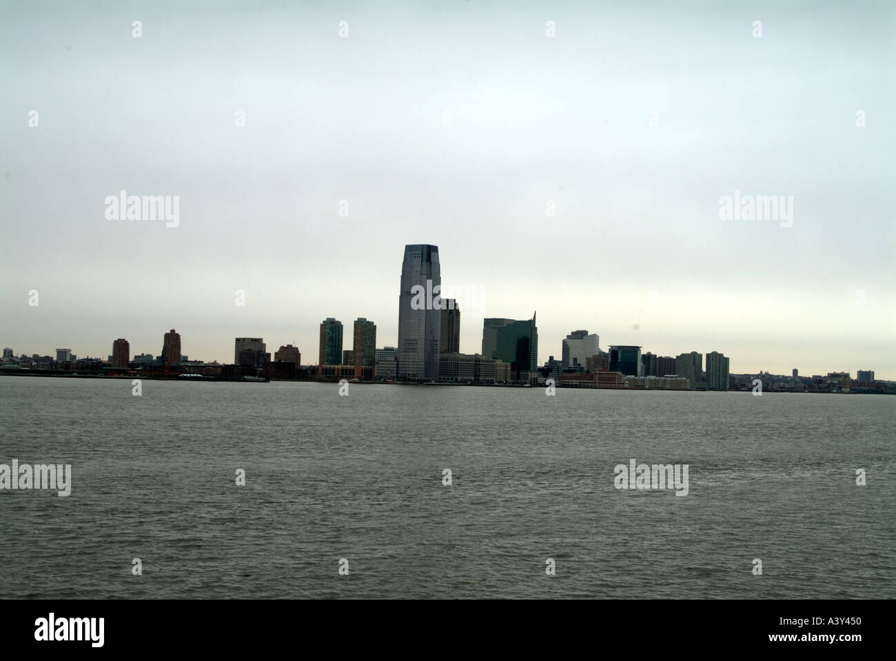 Grey sky river view New York skyline buildings architecture port Stock ...