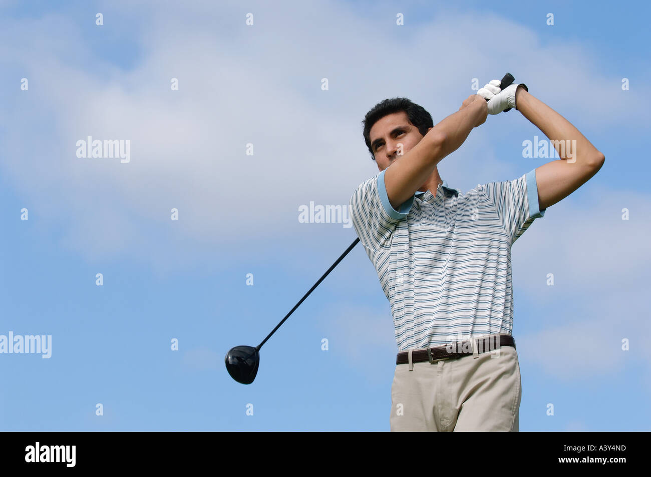 Young Man Playing Golf Stock Photo - Alamy