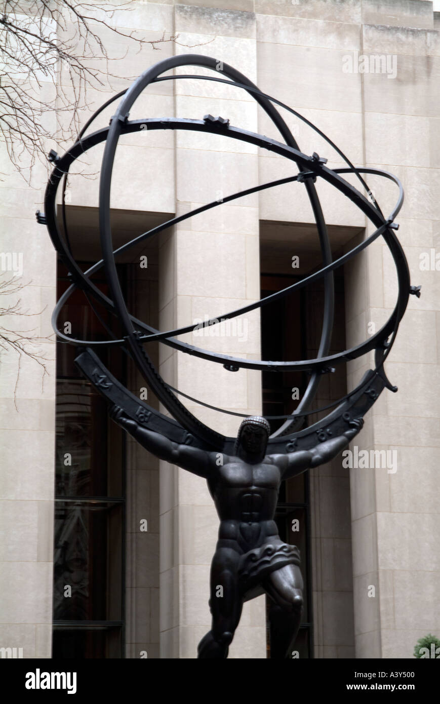 Atlas standing holding world on back sculpture front of building New ...