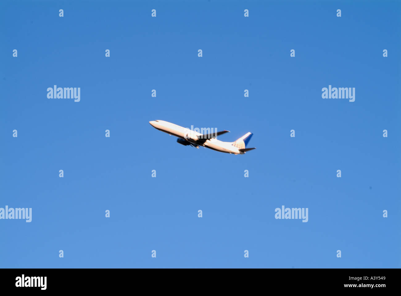 Jet plane flying upward overhead during takeoff Stock Photo - Alamy