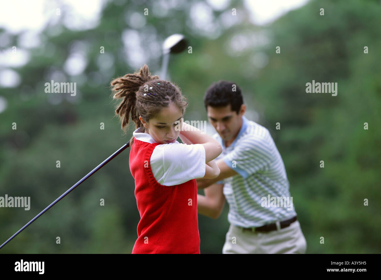 Female Golfer and a Male Golfer Stock Photo - Alamy