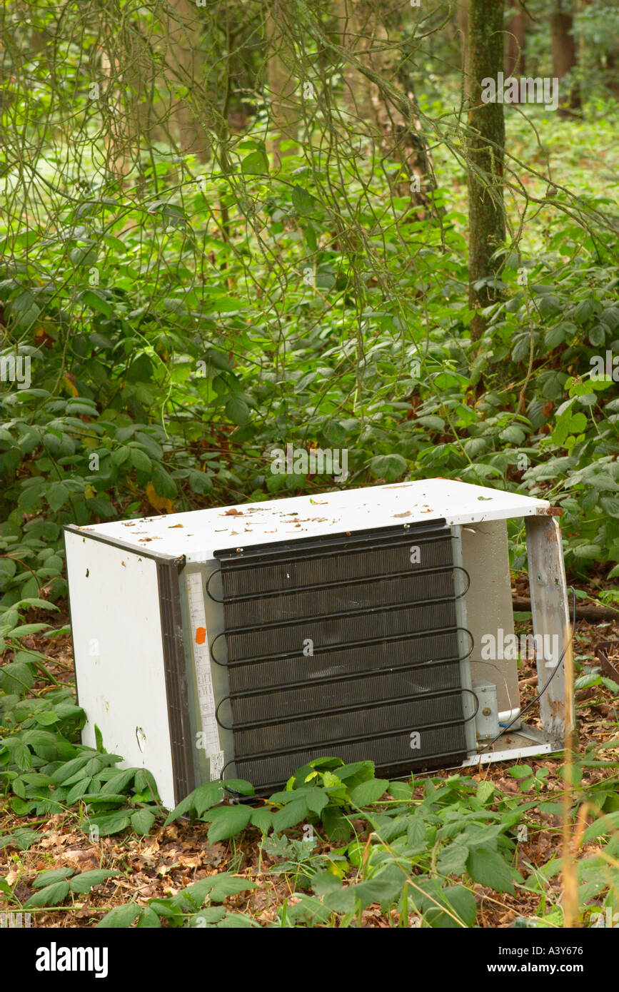 Fly Tipping Disposed Refrigerator in woodland Stock Photo - Alamy