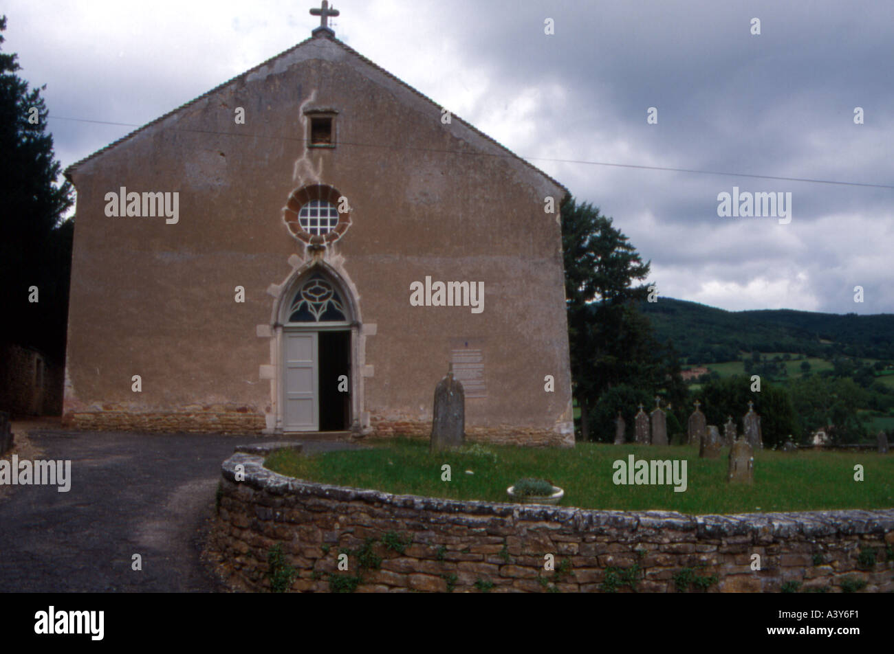 small roman church in the middle of a cemetery saint point village ...
