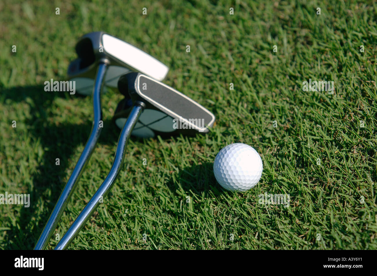Two putters hi-res stock photography and images - Alamy