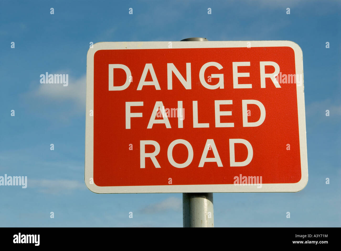 UK red road sign with words Danger Failed Road Stock Photo - Alamy