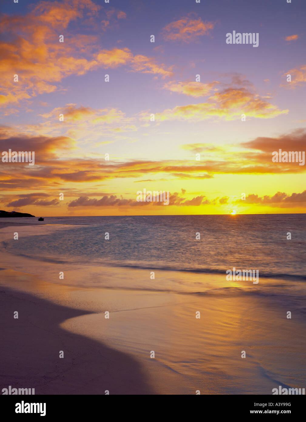 Anguilla, British West Indies: Sun setting over the Caribbean waters ...