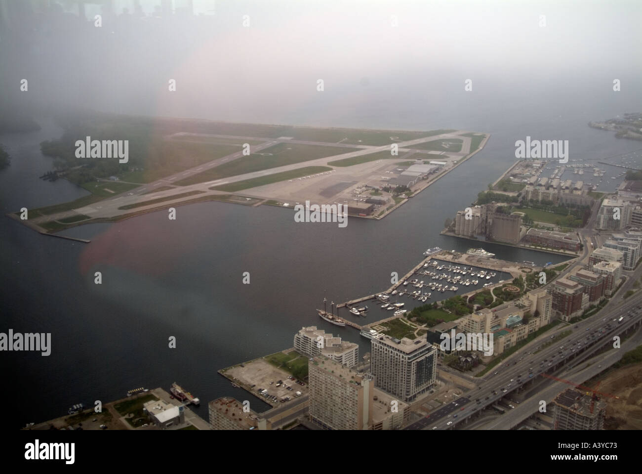 CN Tower aerial view port lake marina boats buildings highways streets ... CN Tower aerial view port lake marina boats buildings highways streets ...