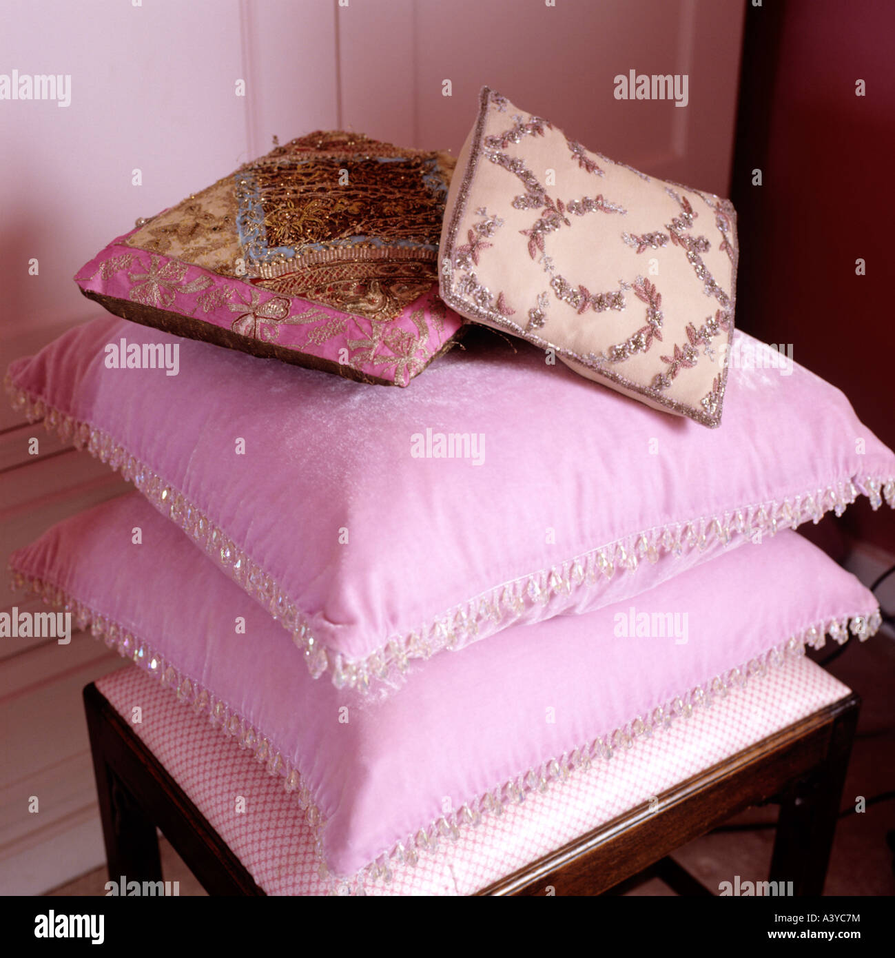 Velvet cushion stack hi-res stock photography and images - Alamy