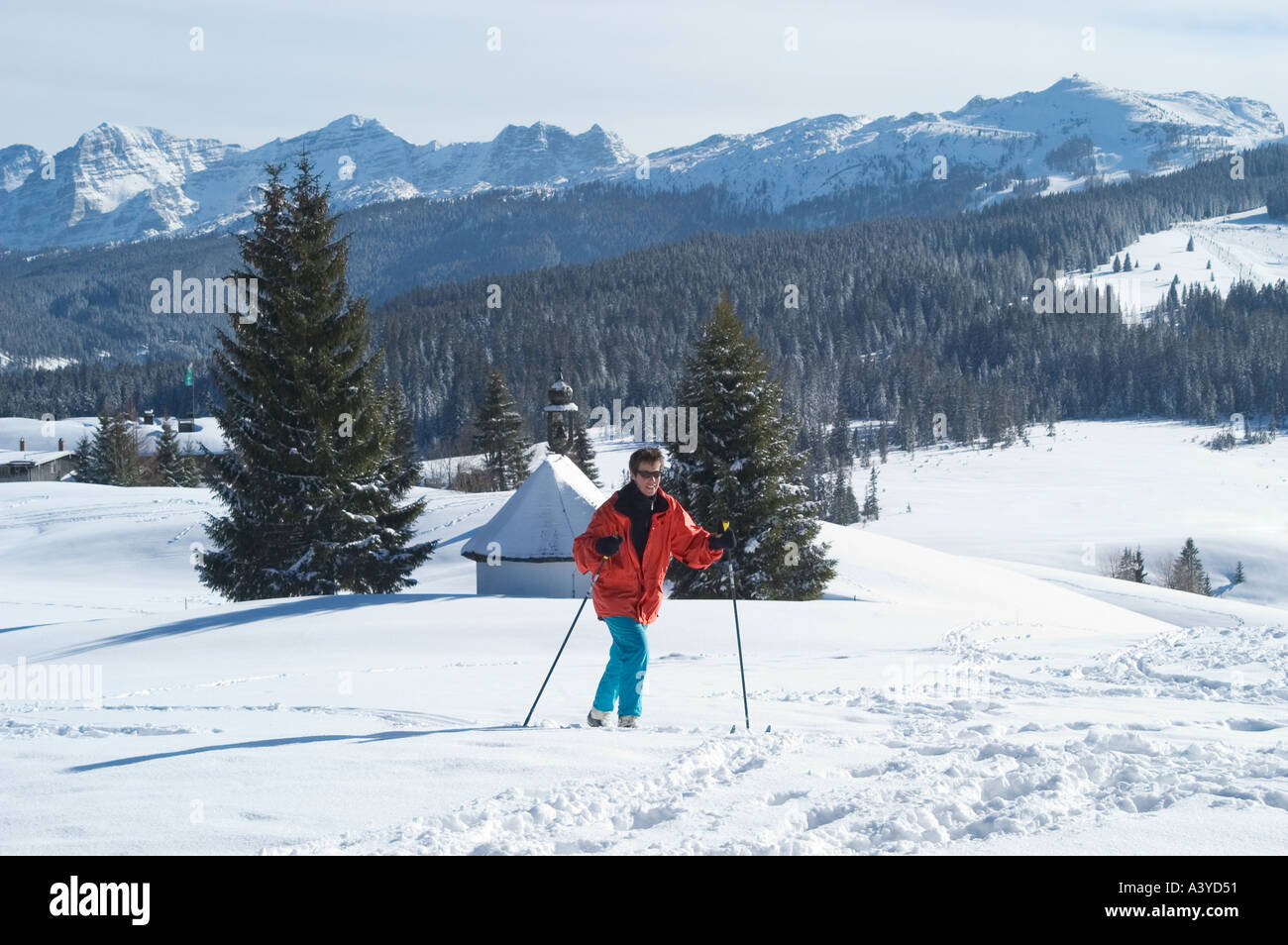 MR Cross country skier in front of Chapel at the Winkelmoosalm Upper ...