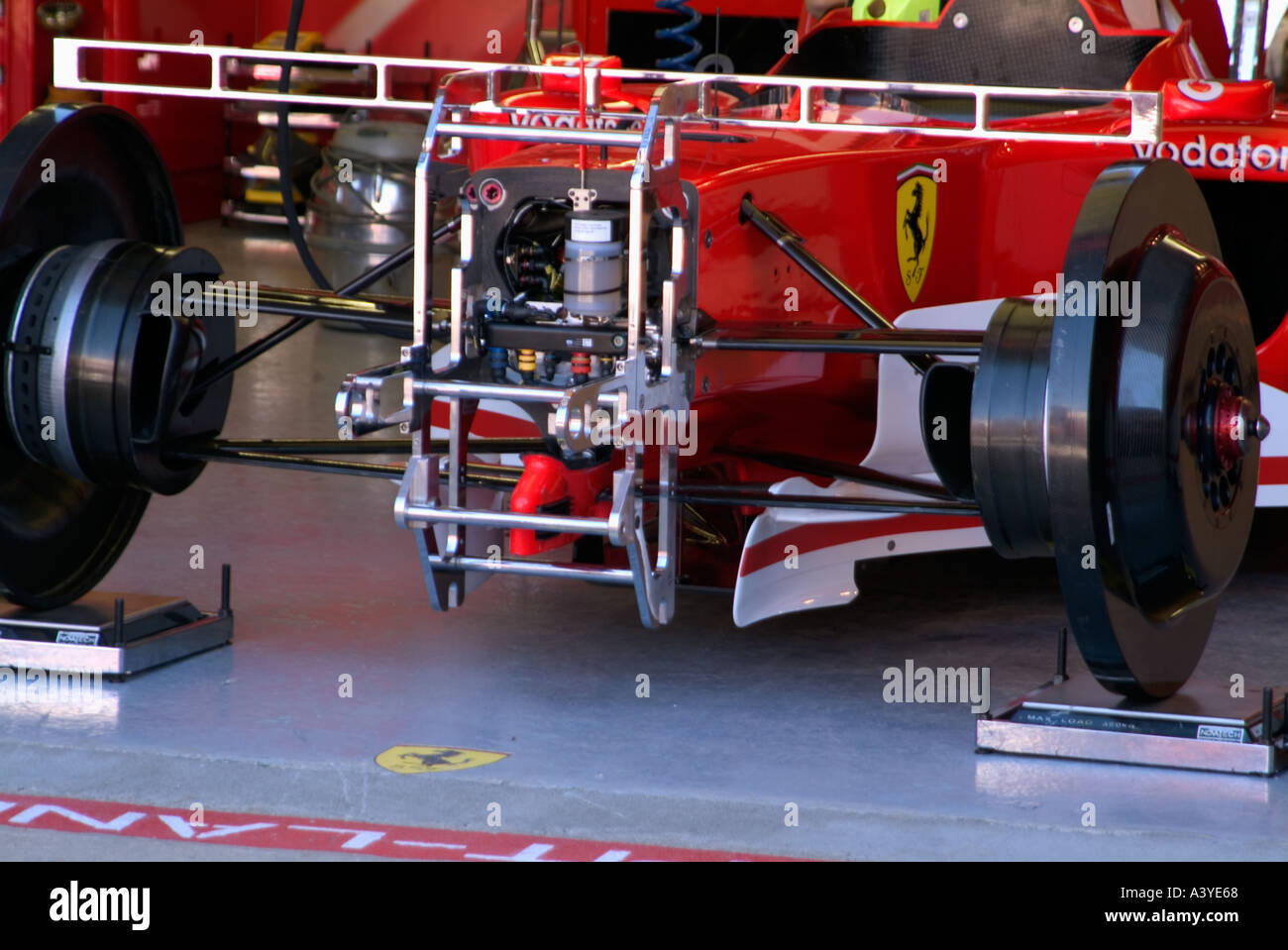 Formula 1 racing car pit lane inside garage front body view Gilles ...