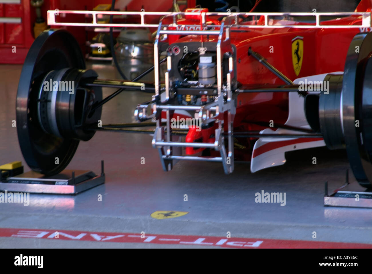 Formula 1 racing car pit lane inside garage front body view Gilles ...
