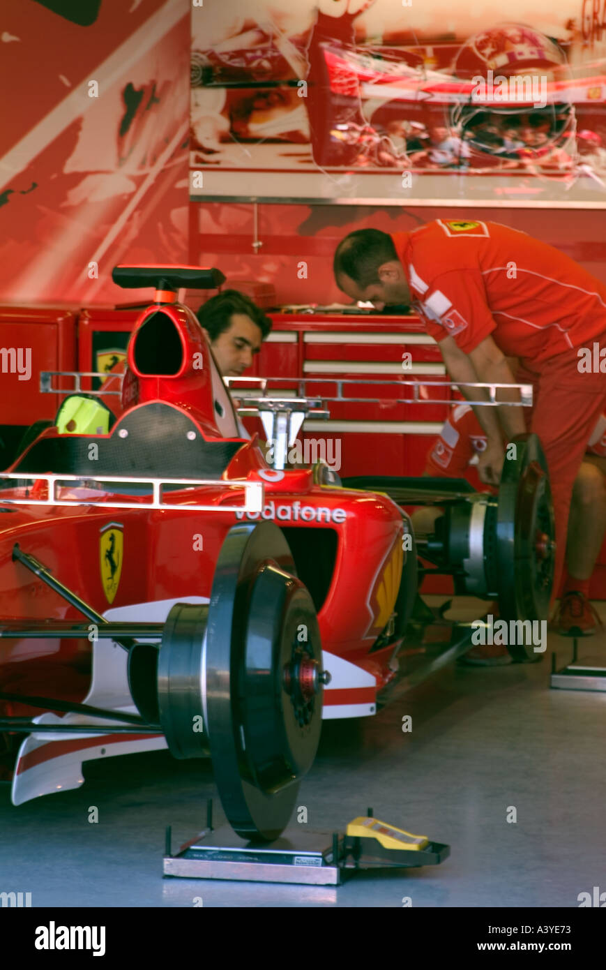Formula 1 racing car pit lane inside garage front body view Gilles ...