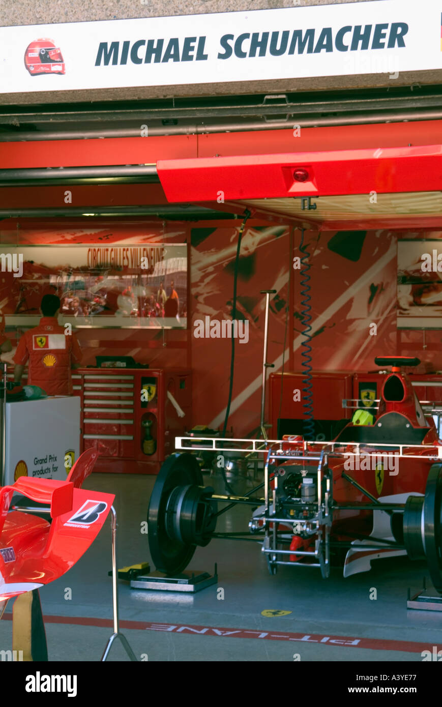 Formula 1 racing car pit lane inside garage front body view Gilles ...