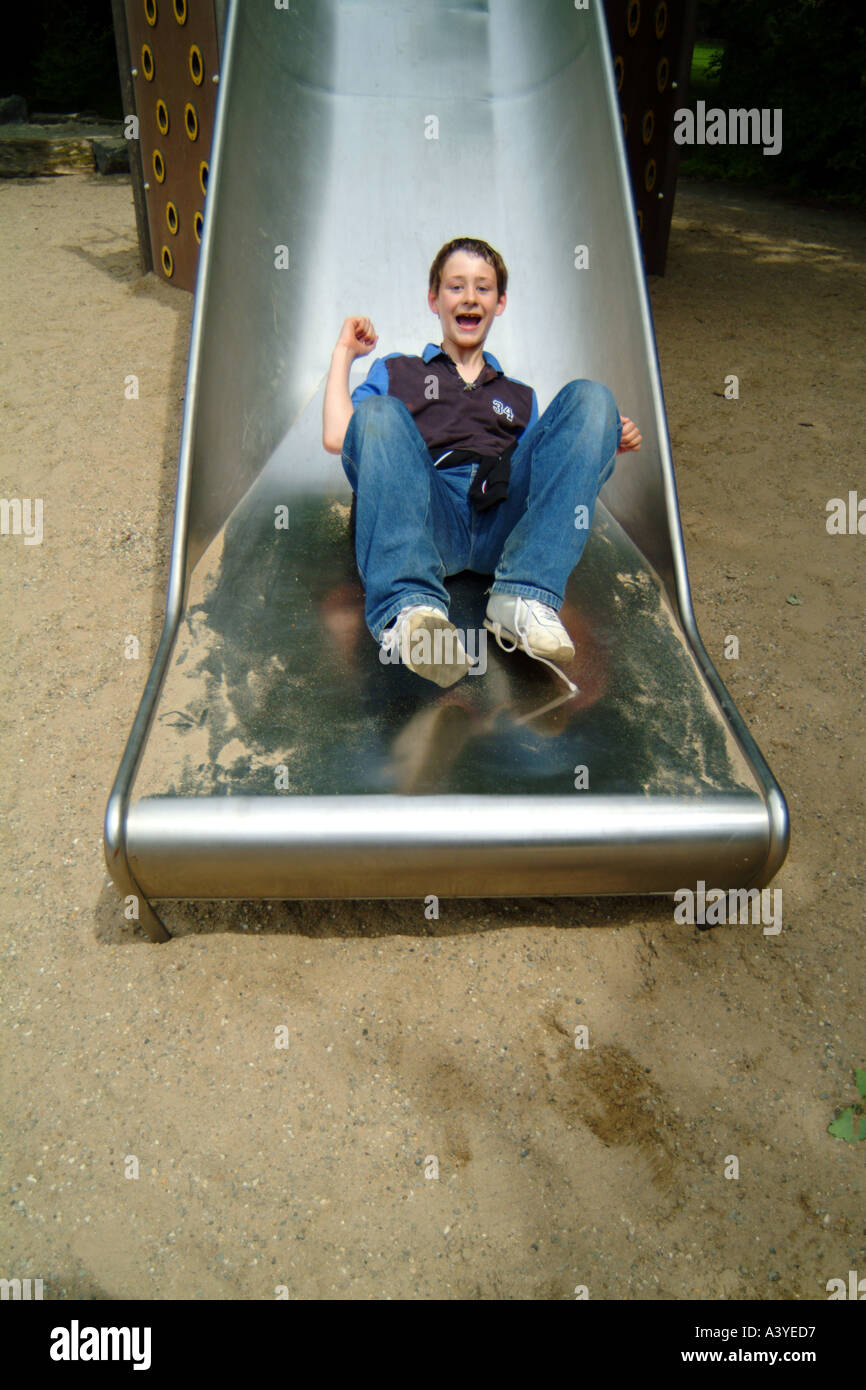 boy kid lad slide Stock Photo - Alamy