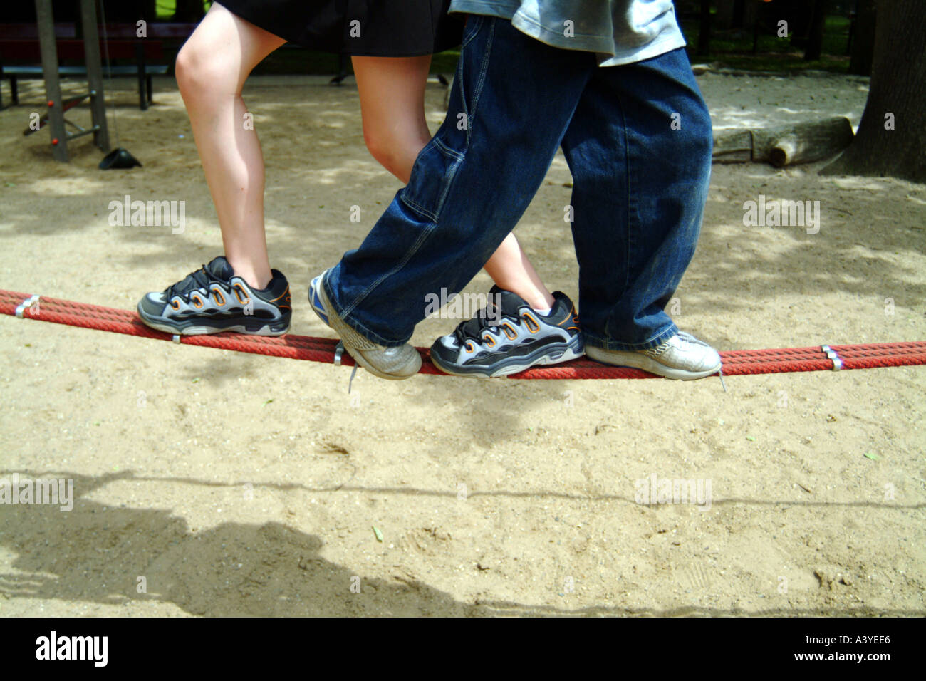 Boy balancing rope hi-res stock photography and images - Alamy