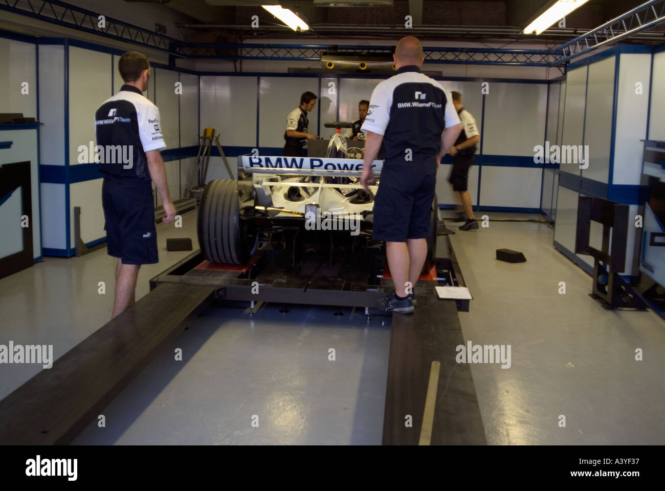 Formula 1 racing car pit lane garage weighing station BMW Gilles ...