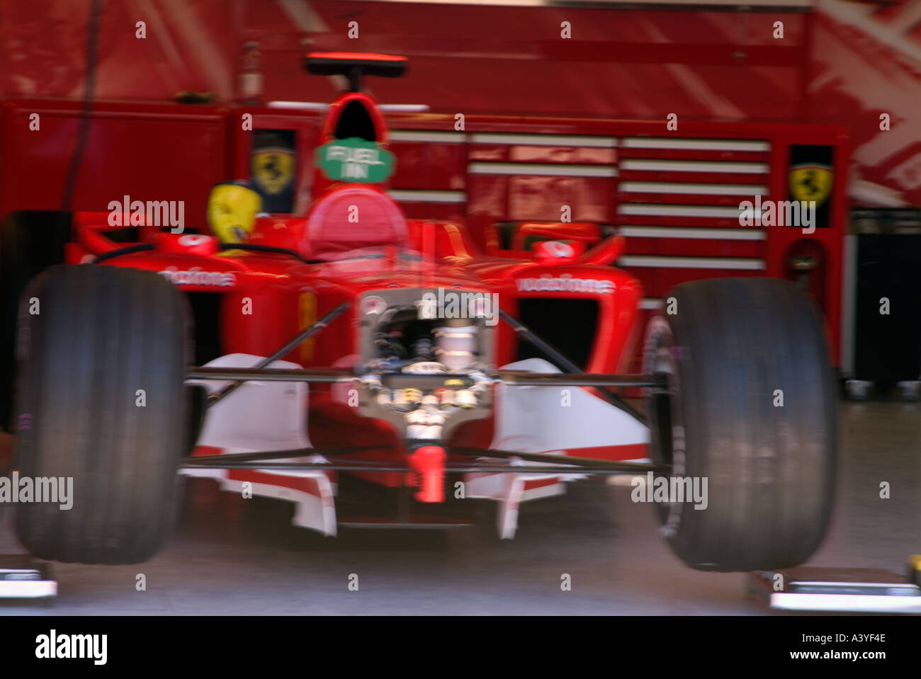 Formula 1 racing car pit lane inside garage front body view Gilles ...