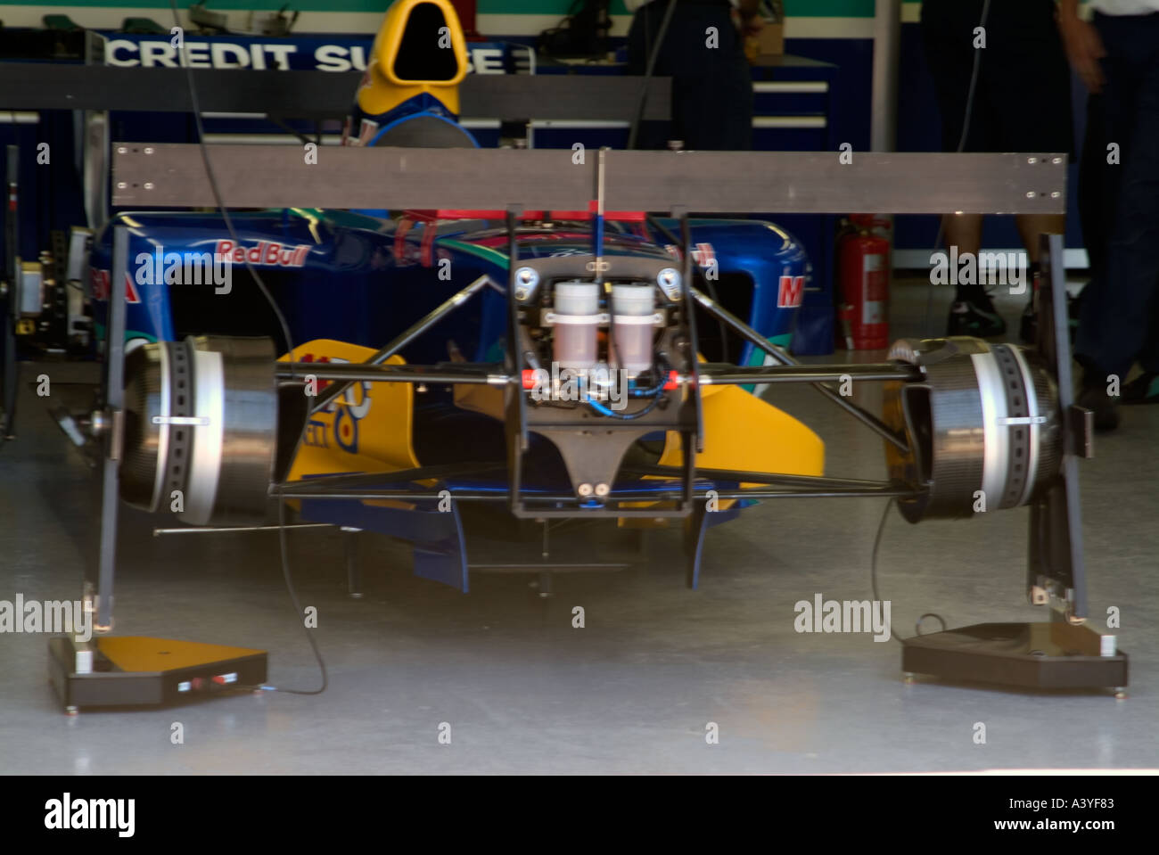 Formula 1 racing car pit lane inside garage front body view Gilles ...
