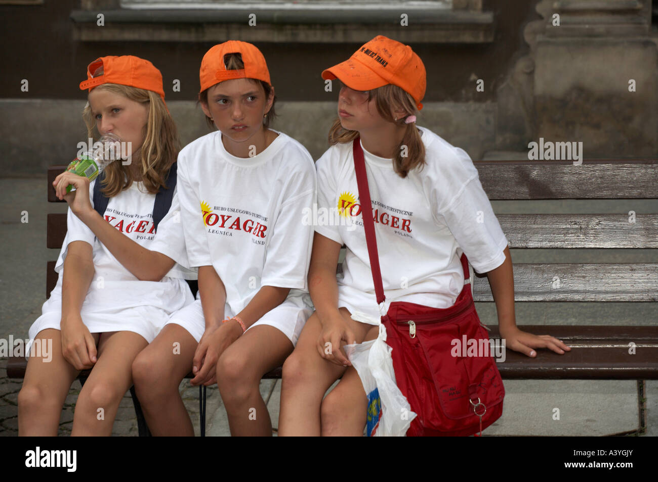 Three school friends take a break Stock Photo - Alamy