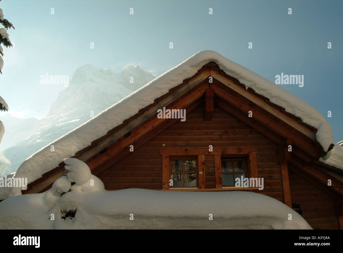 Snow insulating chalet on roof Grindelwald Jungfrau Switzerland Europe ...